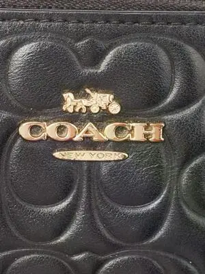 COACH VINTAGE Leather Embossed Clutch