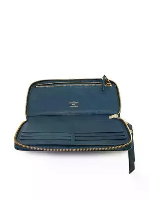 LOUIS VUITTON Monogram Embossed Zip Wallet