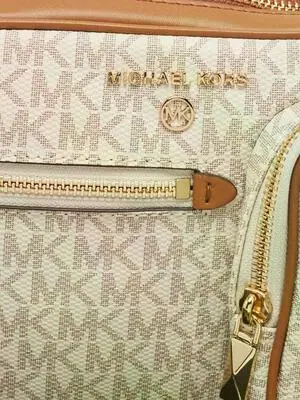 Michael Kors Monogram Leather Clutch