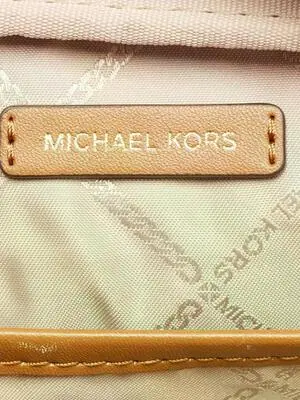 Michael Kors Monogram Leather Clutch