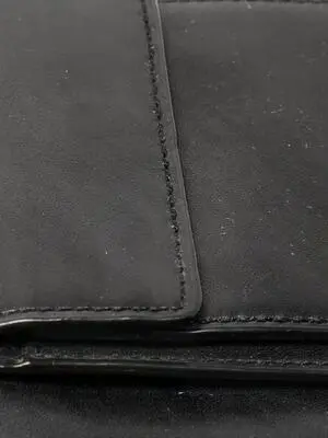 COACH® Logo-embossed Leather Wallet