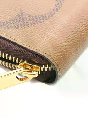 LOUIS VUITTON 2010s Zippy Giant Monogram Reverse Wallet - Brown