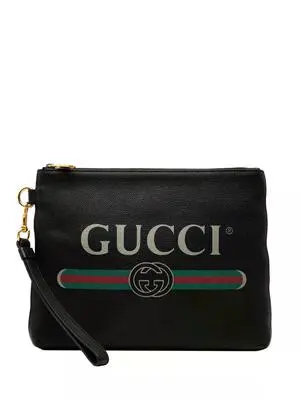 Gucci Printed Clutches