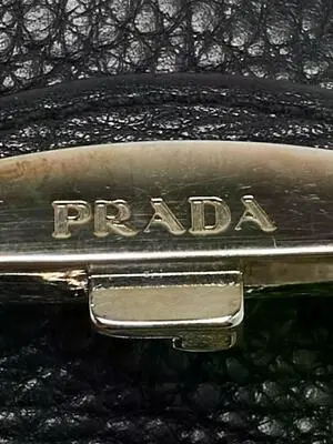Prada Logo-engraved Leather Wallet