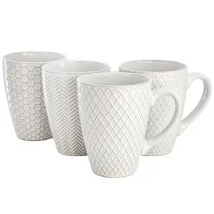 GIBSON ELITE Earlhart 4 Piece 16 Ounce Stoneware Assorted Pattern Mug Set - White