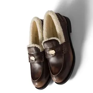 Miu Miu Bleached Leather And Shearling Penny Loafers - White