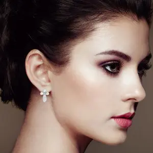 HAUS OF BRILLIANCE Silver Prong Diamond Accent Floral Cross Stud Earrings