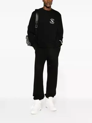 Amiri Staggered Logo-embroidered Track Pants - Black