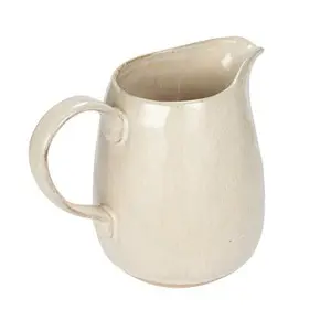 STORIED HOME Stoneware Pitcher With Reactive Glaze And Speckles - Cream