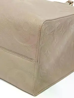 LOUIS VUITTON Onthego Mm Monogram Empreinte Leather Tote Bag - Neutrals