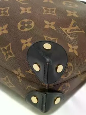 LOUIS VUITTON Monogram Petite Malle Bag