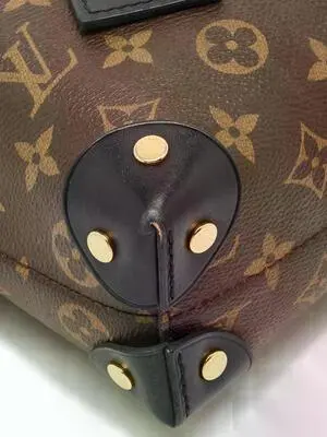 LOUIS VUITTON Monogram Petite Malle Bag