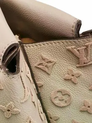 LOUIS VUITTON Monogram-embossed Leather Handbag
