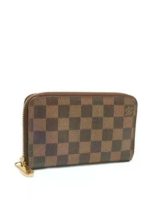 LOUIS VUITTON 2010 Damier Ebene Zip-around Wallet - Brown