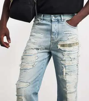 Amiri Repaired Bootcut Jeans