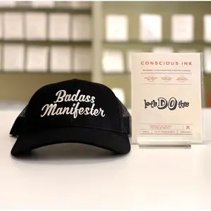 CONSCIOUS INK Badass Manifester Eco Trucker Hat - Black