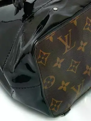 LOUIS VUITTON Monogram-pattern Hot Springs Backpack