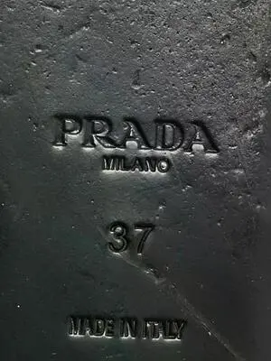 Prada Transparent Triangular Plaque Slides