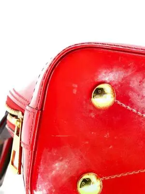 LOUIS VUITTON Alma Handbag Vernis Monogram Canvas Bb Satchel - Red