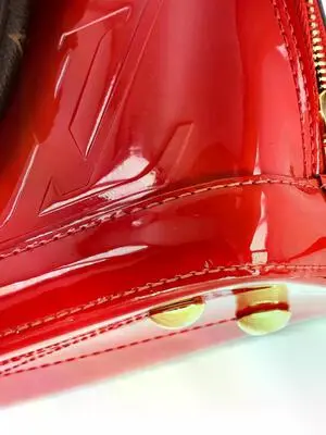 LOUIS VUITTON Alma Handbag Vernis Monogram Canvas Bb Satchel - Red