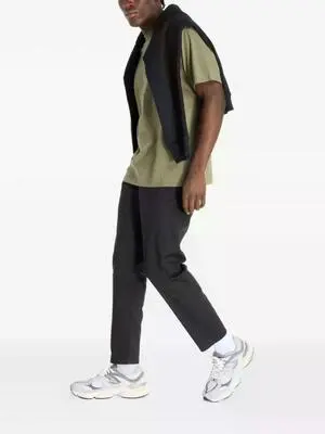 NEW BALANCE Athletics Standard 30 Tapered Trousers