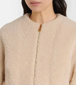 Alaïa Peplum Shearling Jacket - Beige