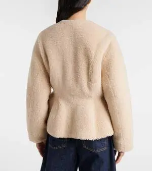 Alaïa Peplum Shearling Jacket - Beige
