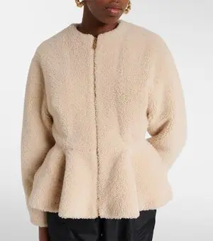 Alaïa Peplum Shearling Jacket