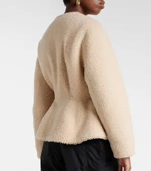 Alaïa Peplum Shearling Jacket