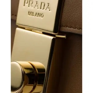 Prada Small Leather Shoulder Bag With Charms - Brown