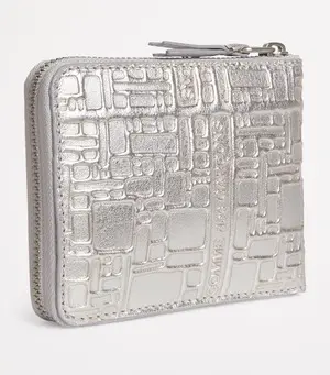 Comme Des Garçons Leather Embossed Logo Zipped Wallet