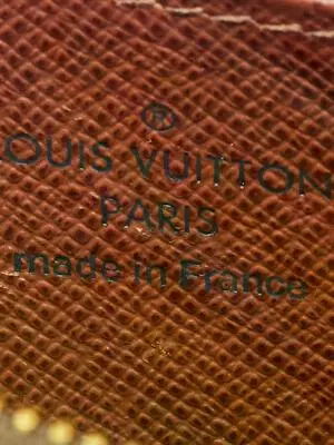 LOUIS VUITTON 2010 Zippy Monogram Wallet