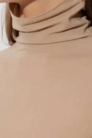Alaïa Turtleneck Bodysuit