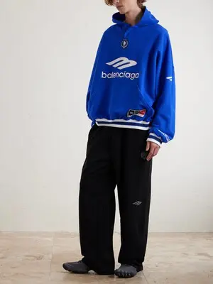 Balenciaga Wide-leg Logo-print Appliquéd Cotton-jersey Sweatpants - Black