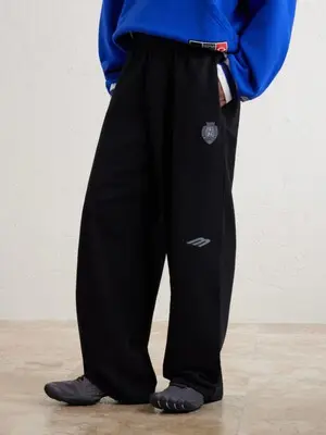 Balenciaga Wide-leg Logo-print Appliquéd Cotton-jersey Sweatpants - Black