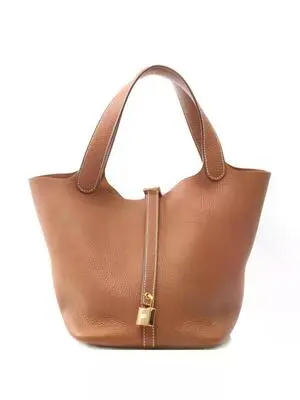 Hermes Gold Tone Bucket Bags