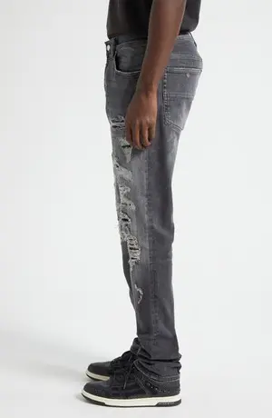 Amiri Varsity Patch Rip & Repair Skinny Jeans