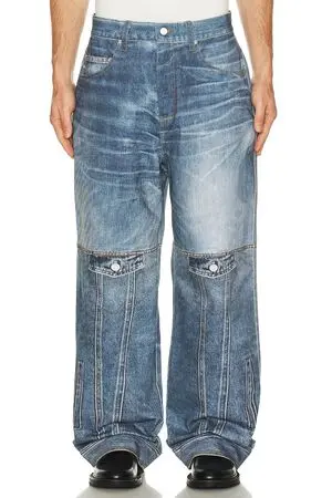 Andersson Bell Custom-like Printed Denim Pants In Blue - Mid Blue