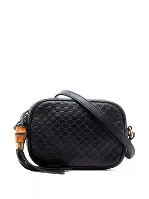 Gucci Embossed Cross Body Bags