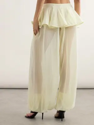 Alaïa Pleated Georgette Peplum Tapered Pants - Yellow