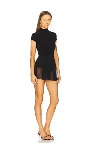 Norma Kamali Mock Neck Flared Pickleball Dress