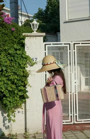 K'AI & VROSI Woven Straw Handbag With Leather Trim