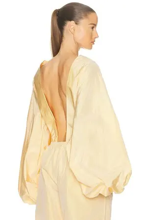 Alaia Open Back Bodysuits