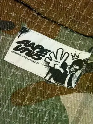 AAPE BY *A BATHING APE® Camouflage Print Trousers