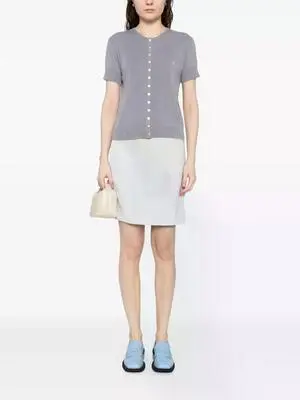 AGNES B. Short-sleeved Snap Top