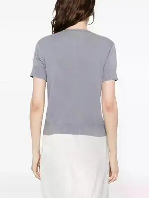 AGNES B. Short-sleeved Snap Top