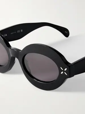 Alaïa Oval-frame Sunglasses - Black