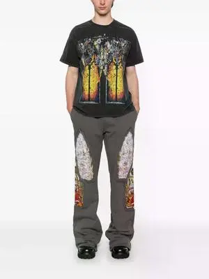 WHO DECIDES WAR BY EV BRAVADO Triple Flame Glass Trousers