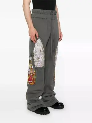 WHO DECIDES WAR BY EV BRAVADO Triple Flame Glass Trousers