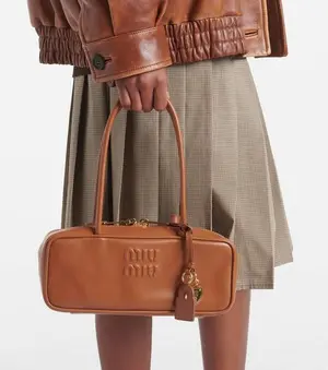 Miu Miu Logo Embossed Leather Tote Bag